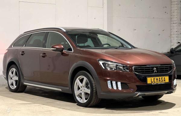 Brown Peugeot 508 RXH 2014 in Klaipeda, with an engine capacity of 2.00 L and mileage of 245 thousand km for 8888 €, photo 6 on AUTOMOTO.COM.LV