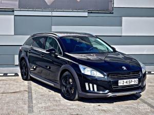 Peugeot 508 RXH 2013 in Panevezys, with an engine capacity of 2.00 L and mileage of 250 thousand km for 4950 €, photo 3 on AUTOMOTO.COM.LV