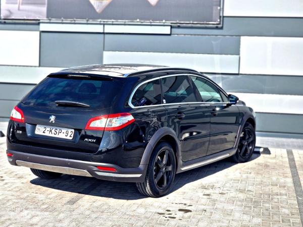 Peugeot 508 RXH 2013 in Panevezys, with an engine capacity of 2.00 L and mileage of 250 thousand km for 4950 €, photo 6 on AUTOMOTO.COM.LV