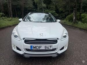 White Peugeot 508 RXH 2013 in Vilnius, with an engine capacity of 2.00 L and mileage of 290 thousand km for 3200 €, photo 3 on AUTOMOTO.COM.LV