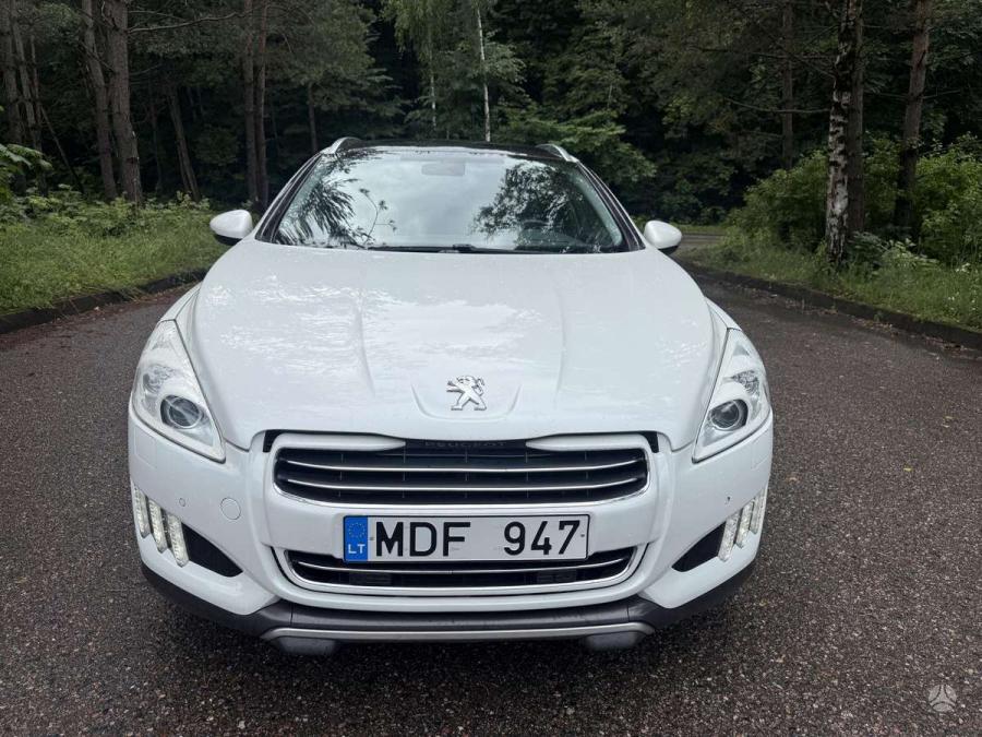 White Peugeot 508 RXH 2013 in Vilnius, with an engine capacity of 2.00 L and mileage of 290 thousand km for 3200 €, photo 3 on AUTOMOTO.COM.LV