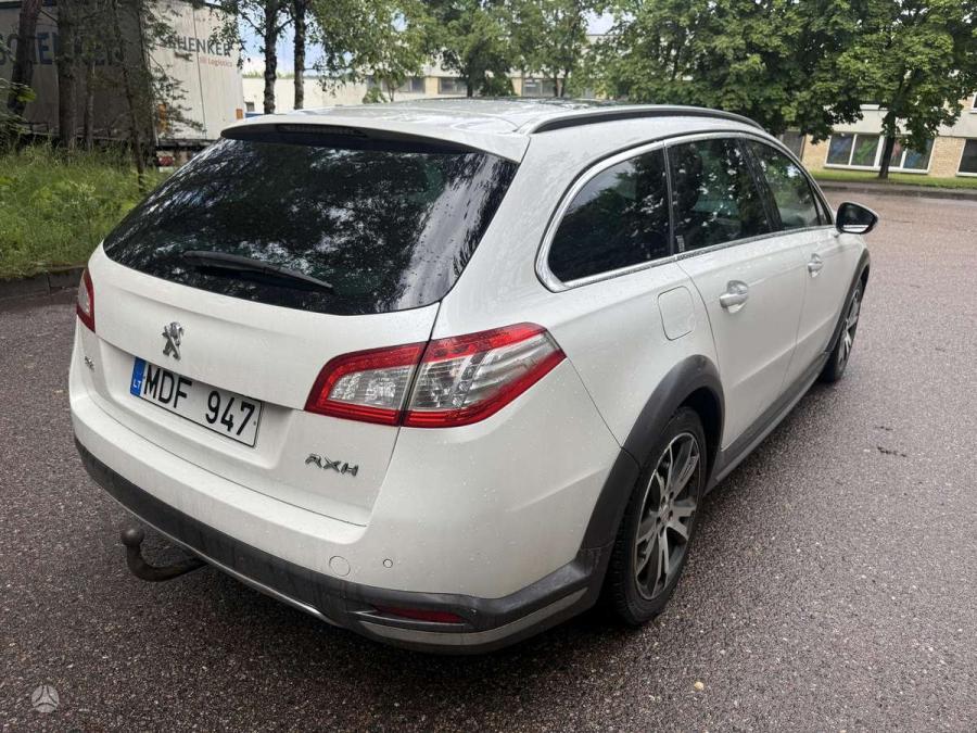 White Peugeot 508 RXH 2013 in Vilnius, with an engine capacity of 2.00 L and mileage of 290 thousand km for 3200 €, photo 6 on AUTOMOTO.COM.LV