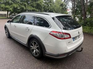 White Peugeot 508 RXH 2013 in Vilnius, with an engine capacity of 2.00 L and mileage of 290 thousand km for 3200 €, photo 7 on AUTOMOTO.COM.LV