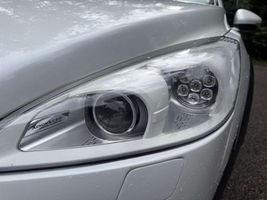 White Peugeot 508 RXH 2013 in Vilnius, with an engine capacity of 2.00 L and mileage of 290 thousand km for 3200 €, photo 11 on AUTOMOTO.COM.LV