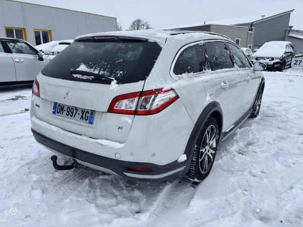 White Peugeot 508 RXH 2014 in Taurage, with an engine capacity of 2.00 L and mileage of 100 thousand km for 5700 €, photo 5 on AUTOMOTO.COM.LV