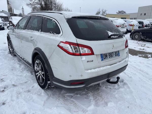 White Peugeot 508 RXH 2014 in Taurage, with an engine capacity of 2.00 L and mileage of 100 thousand km for 5700 €, photo 6 on AUTOMOTO.COM.LV