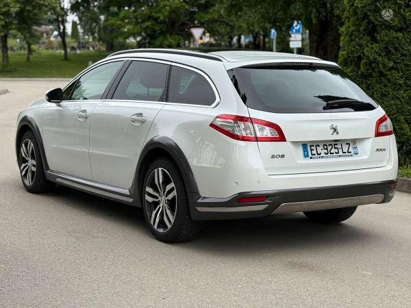 White Peugeot 508 RXH 2016 in Taurage, with an engine capacity of 2.00 L and mileage of 280 thousand km for 6400 €, photo 8 on AUTOMOTO.COM.LV