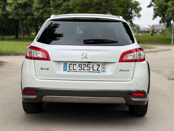 White Peugeot 508 RXH 2016 in Taurage, with an engine capacity of 2.00 L and mileage of 280 thousand km for 6400 €, photo 9 on AUTOMOTO.COM.LV