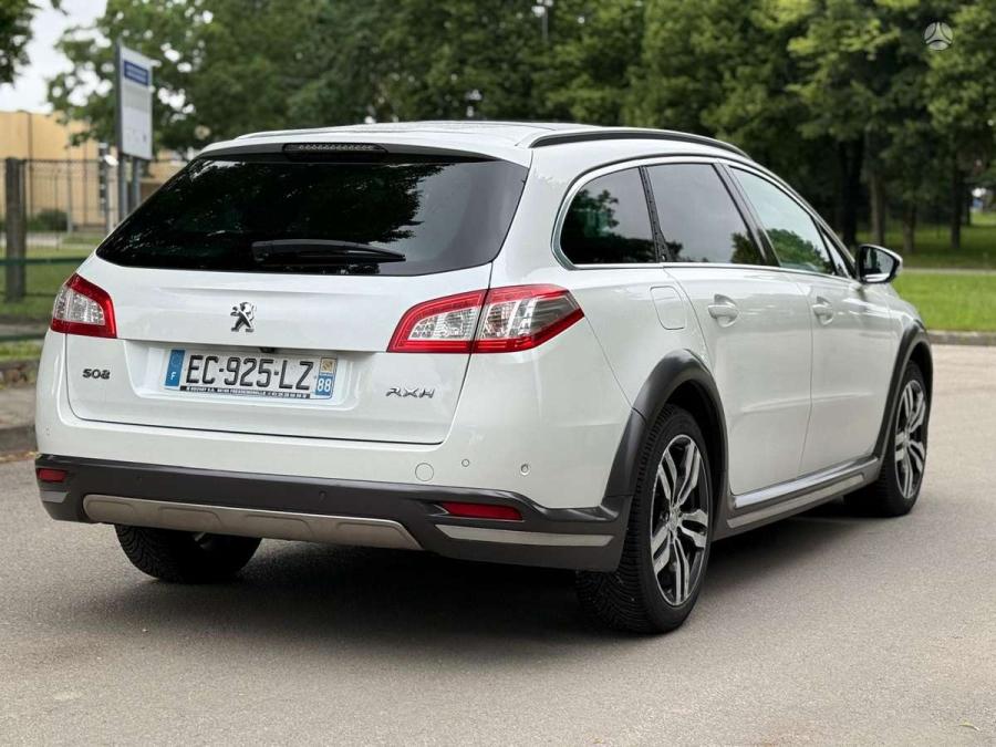 White Peugeot 508 RXH 2016 in Taurage, with an engine capacity of 2.00 L and mileage of 280 thousand km for 6400 €, photo 8 on AUTOMOTO.COM.LV