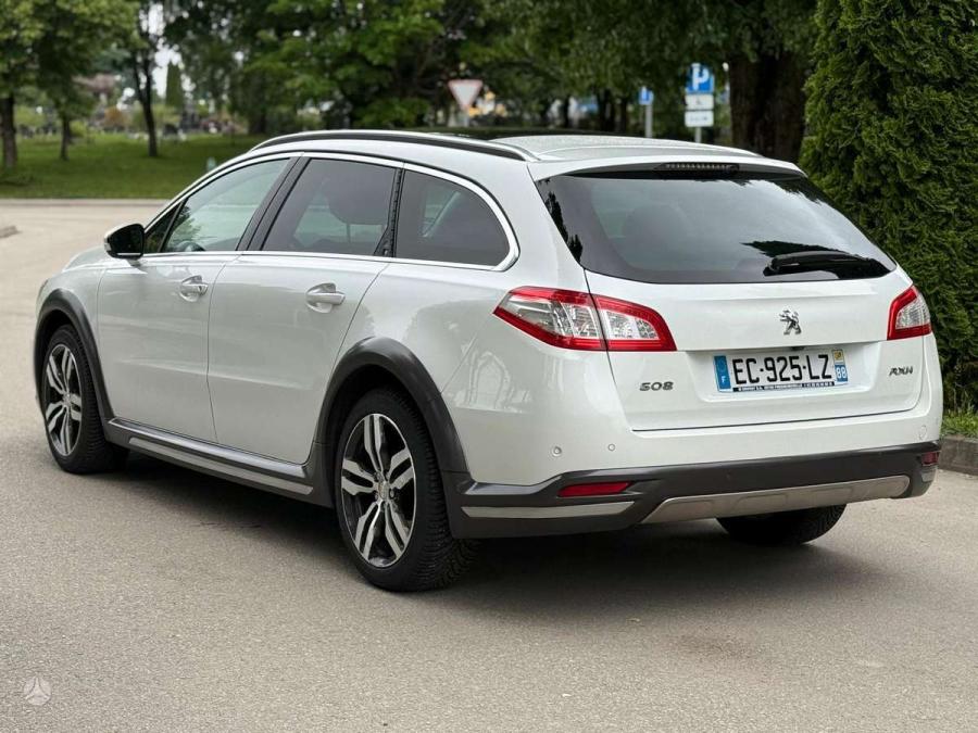 White Peugeot 508 RXH 2016 in Taurage, with an engine capacity of 2.00 L and mileage of 280 thousand km for 6400 €, photo 12 on AUTOMOTO.COM.LV