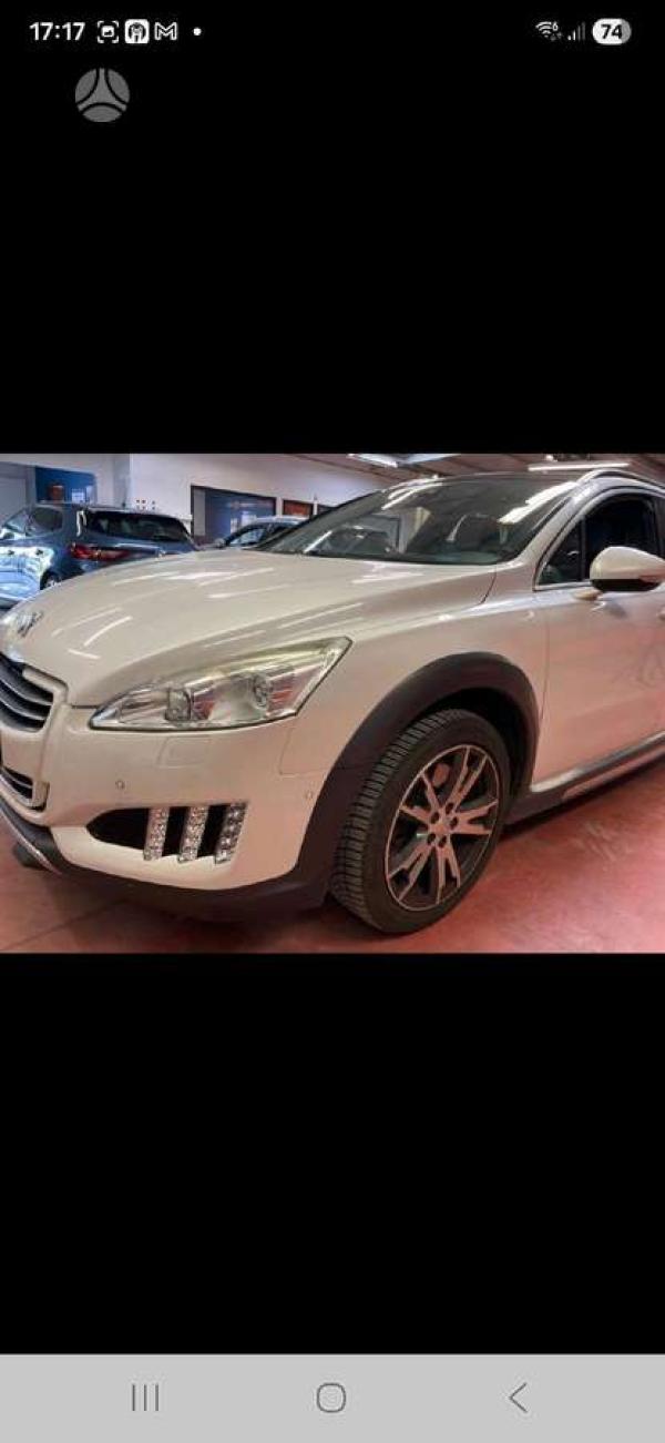 White Peugeot 508 RXH 2013 in Sirvintos, with an engine capacity of 2.00 L and mileage of 191 thousand km for 5999 €, photo 8 on AUTOMOTO.COM.LV