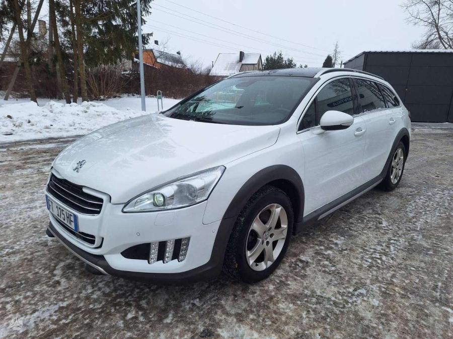 White Peugeot 508 RXH 2013 in Kelme, with an engine capacity of 2.00 L and mileage of 237 thousand km for 5350 €, photo 1 on AUTOMOTO.COM.LV