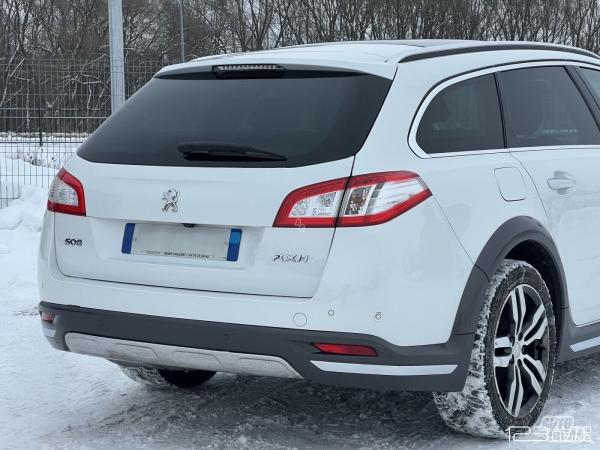 White Peugeot 508 RXH 2015 in Taurage, with an engine capacity of 2.00 L and mileage of 236 thousand km for 7999 €, photo 6 on AUTOMOTO.COM.LV