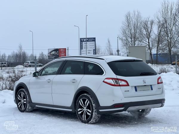 White Peugeot 508 RXH 2015 in Taurage, with an engine capacity of 2.00 L and mileage of 236 thousand km for 7999 €, photo 8 on AUTOMOTO.COM.LV