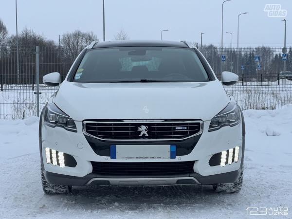 White Peugeot 508 RXH 2015 in Taurage, with an engine capacity of 2.00 L and mileage of 236 thousand km for 7999 €, photo 3 on AUTOMOTO.COM.LV