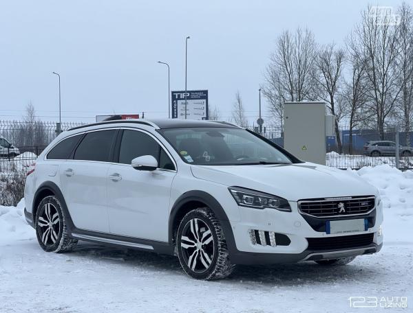 White Peugeot 508 RXH 2015 in Taurage, with an engine capacity of 2.00 L and mileage of 236 thousand km for 7999 €, photo 4 on AUTOMOTO.COM.LV