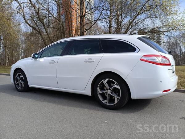 White Peugeot 508 2015 in Riga, with an engine capacity of 2.00 L and mileage of 245 thousand km for 7500 €, photo 4 on AUTOMOTO.COM.LV