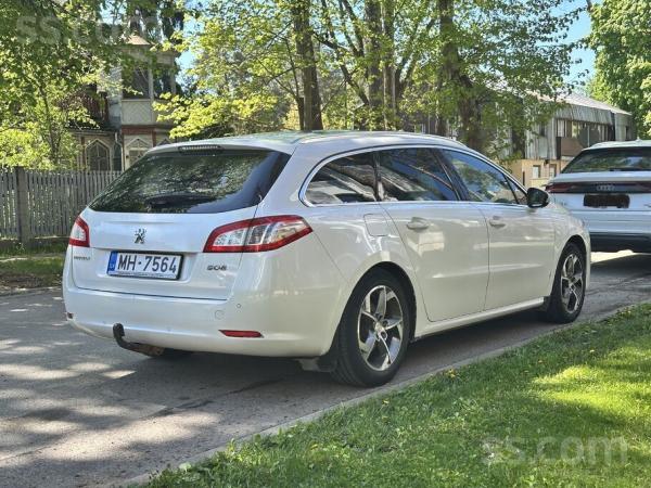 White Peugeot 508 2015 in Riga, with an engine capacity of 2.00 L and mileage of 303 thousand km for 6300 €, photo 4 on AUTOMOTO.COM.LV