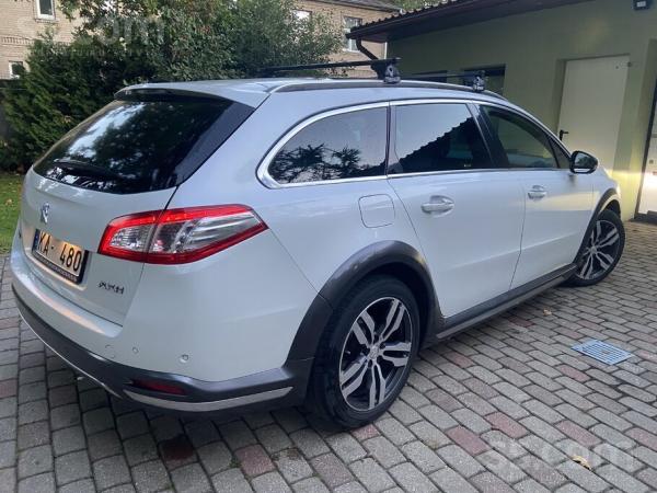 White Peugeot 508 2015 in Riga, with an engine capacity of 2.00 L and mileage of 265 thousand km for 6700 €, photo 5 on AUTOMOTO.COM.LV