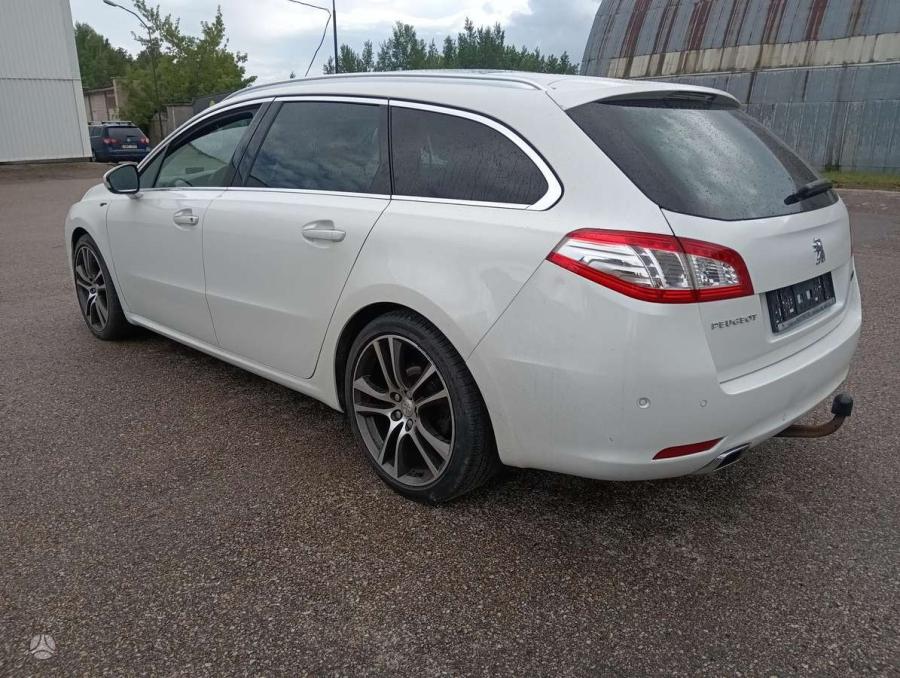 White Peugeot 508 2016 in Utena, with an engine capacity of 2.00 L and mileage of 195 thousand km for 6990 €, photo 5 on AUTOMOTO.COM.LV