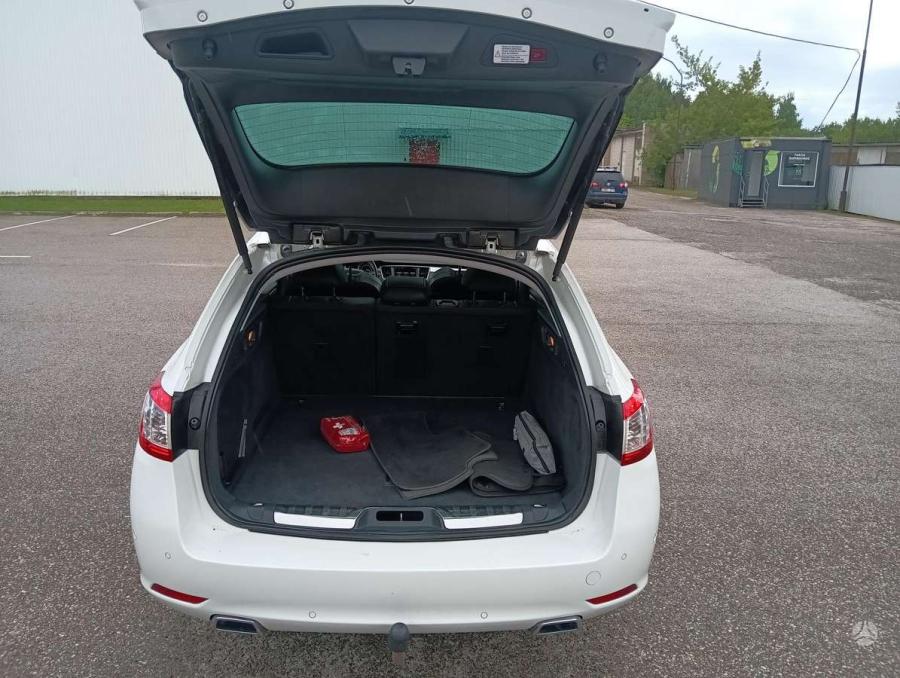 White Peugeot 508 2016 in Utena, with an engine capacity of 2.00 L and mileage of 195 thousand km for 6990 €, photo 8 on AUTOMOTO.COM.LV