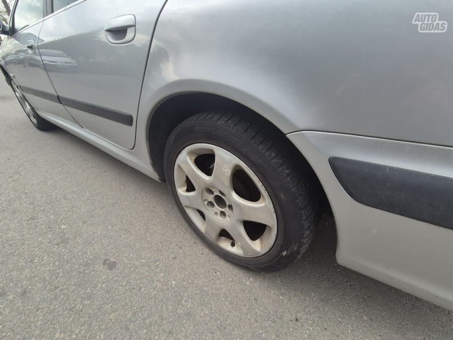 Grey Peugeot 607 2004 in Klaipeda, with an engine capacity of 2.20 L and mileage of 218 thousand km for 550 €, photo 8 on AUTOMOTO.COM.LV