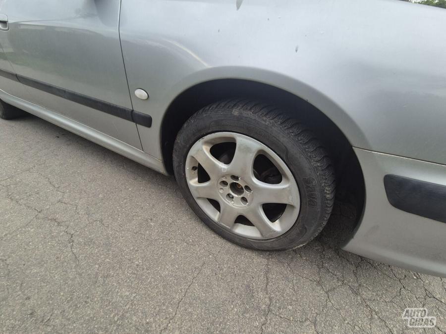 Grey Peugeot 607 2004 in Klaipeda, with an engine capacity of 2.20 L and mileage of 218 thousand km for 550 €, photo 13 on AUTOMOTO.COM.LV