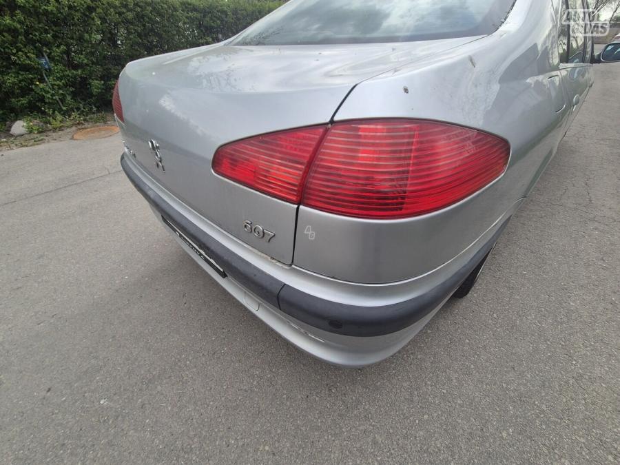Grey Peugeot 607 2004 in Klaipeda, with an engine capacity of 2.20 L and mileage of 218 thousand km for 550 €, photo 15 on AUTOMOTO.COM.LV