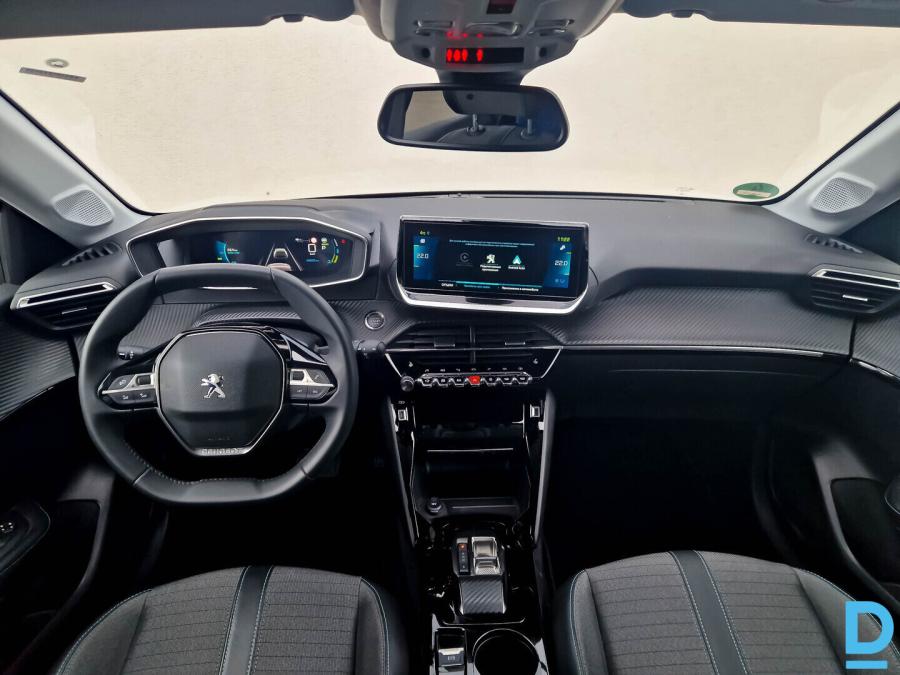 White Peugeot e-208 2022 in Riga, with an engine capacity of 0.00 L and mileage of 49 thousand km for 14999 €, photo 13 on AUTOMOTO.COM.LV
