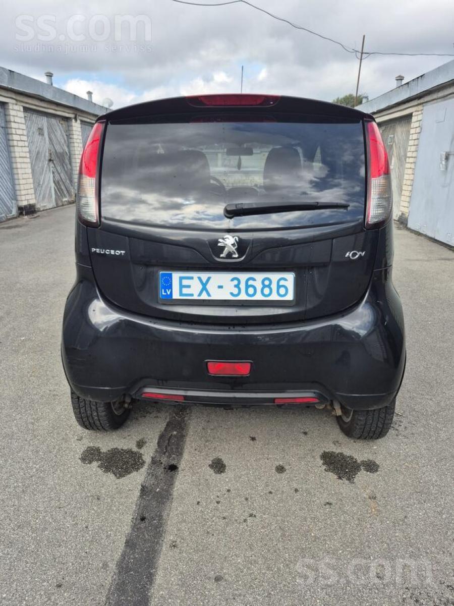 Black Peugeot iOn 2013 in Riga, with an engine capacity of 0.00 L and mileage of 111 thousand km for 2200 €, photo 5 on AUTOMOTO.COM.LV