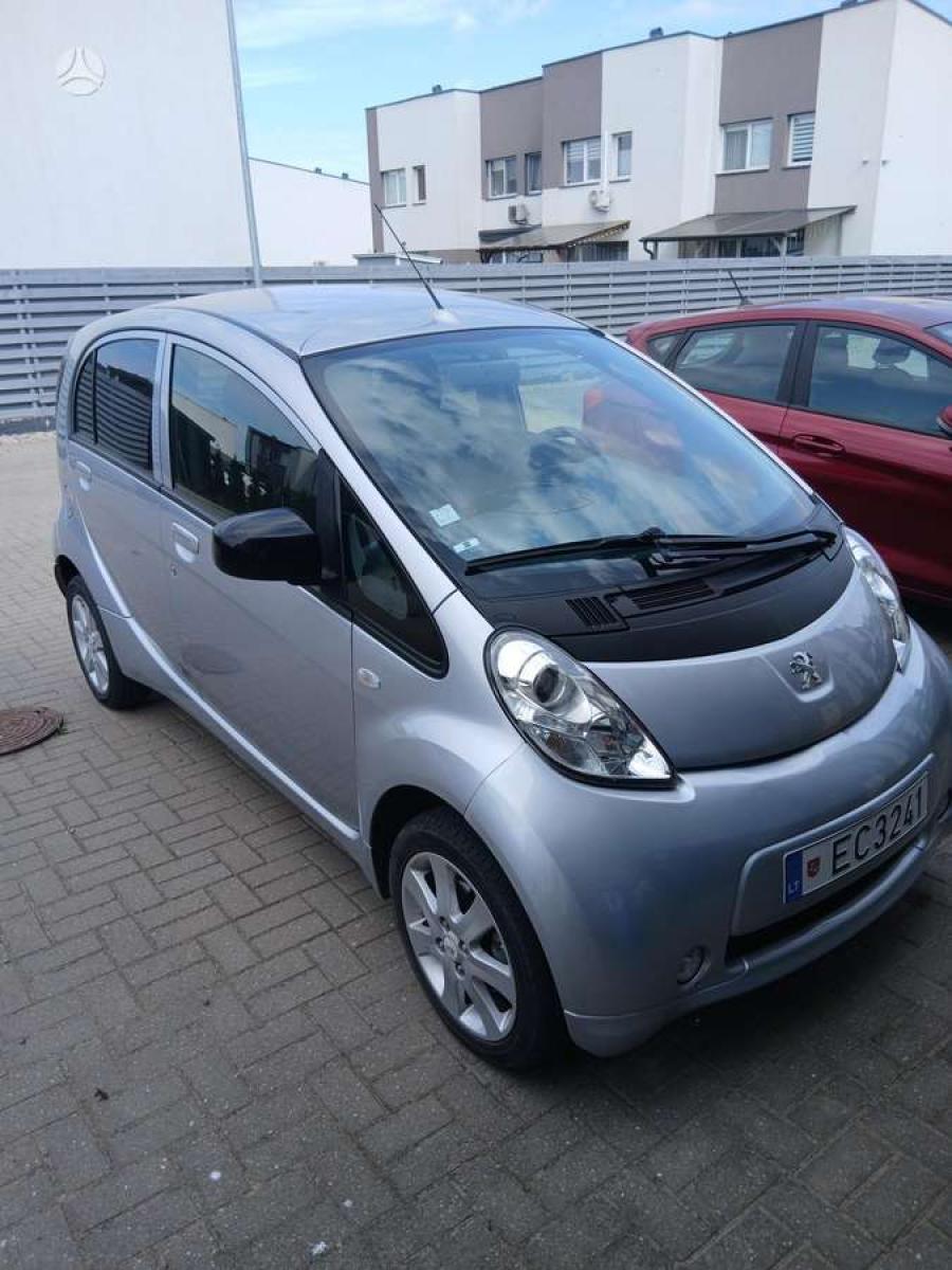 Grey Peugeot iOn 2016 in Kaunas, with an engine capacity of 0.00 L and mileage of 25 thousand km for 2950 €, photo 5 on AUTOMOTO.COM.LV