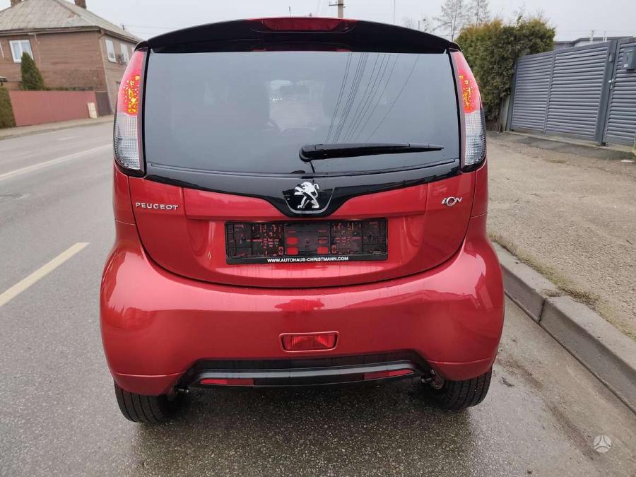 Red Peugeot iOn 2017 in Kaunas, with an engine capacity of 0.00 L and mileage of 36 thousand km for 4700 €, photo 4 on AUTOMOTO.COM.LV