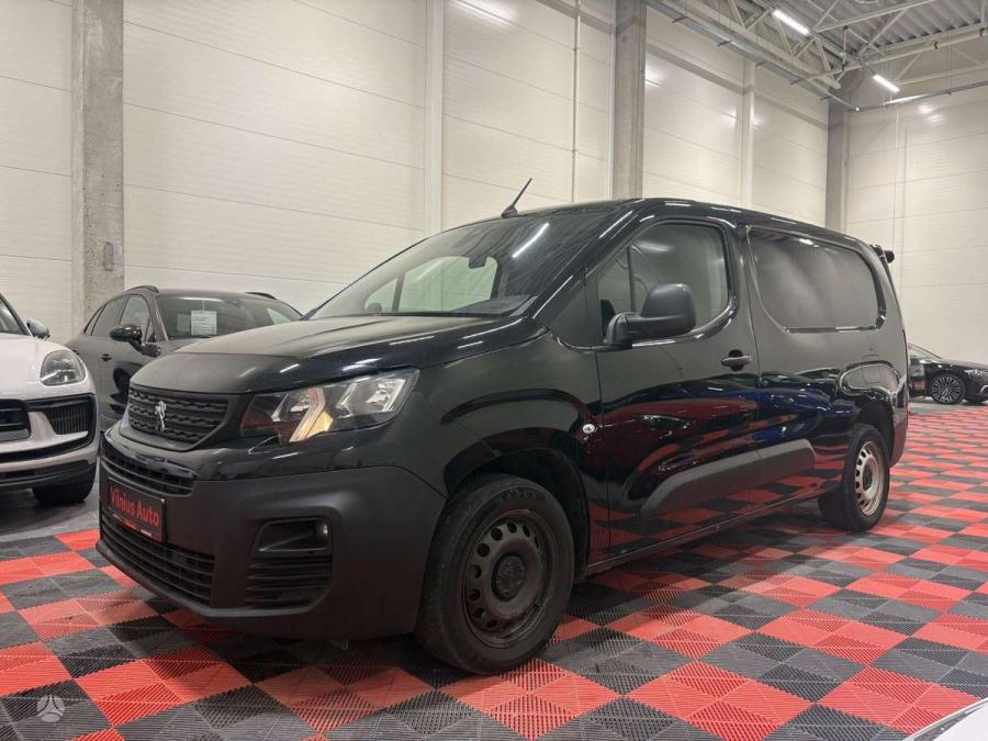 Black Peugeot Partner 2021 in Vilnius, with an engine capacity of 1.20 L and mileage of 296 thousand km for 7490 €, photo 1 on AUTOMOTO.COM.LV