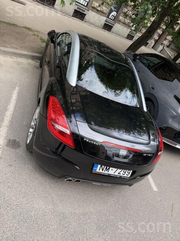 Black Peugeot RCZ 2013 in Riga, with an engine capacity of 1.60 L and mileage of 156 thousand km for 9700 €, photo 9 on AUTOMOTO.COM.LV