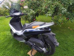 Синий Piaggio Beverly 2012 в Пасвалис, объемом двигателя 0.33 л и пробегом 18 тыс. км за 400 €, фото 6 на AUTOMOTO.COM.LV