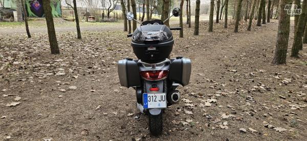 Pelēks Piaggio Liberty 2004 Kauņa, ar dzinēja tilpumu 0.13 L un nobraukumu 21 tūkst. km par 1000 €, foto 6 vietnē AUTOMOTO.COM.LV