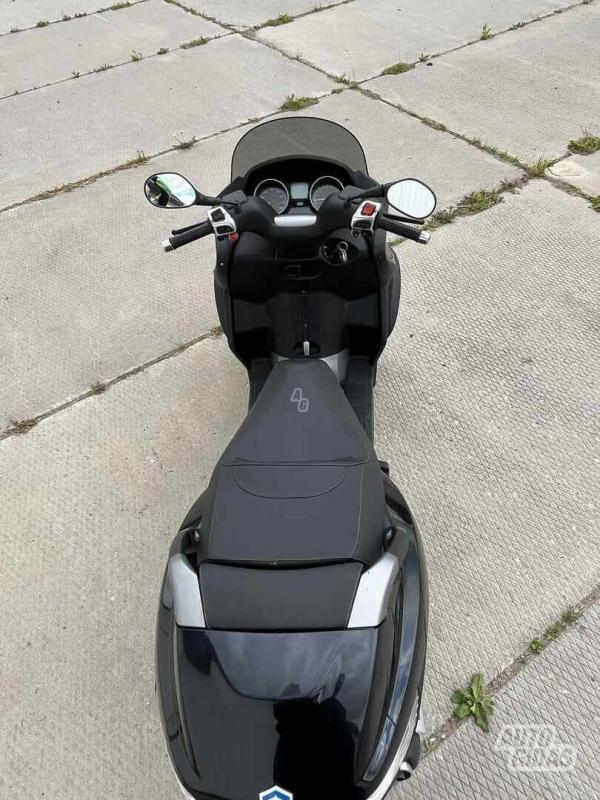 Black Piaggio MP3 2009 in Vilnius, with an engine capacity of 0.25 L and mileage of 8 thousand km for 2200 €, photo 9 on AUTOMOTO.COM.LV