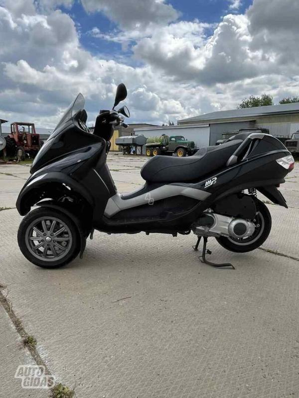 Melns Piaggio MP3 2009 Viļņa, ar dzinēja tilpumu 0.25 L un nobraukumu 8 tūkst. km par 2200 €, foto 2 vietnē AUTOMOTO.COM.LV