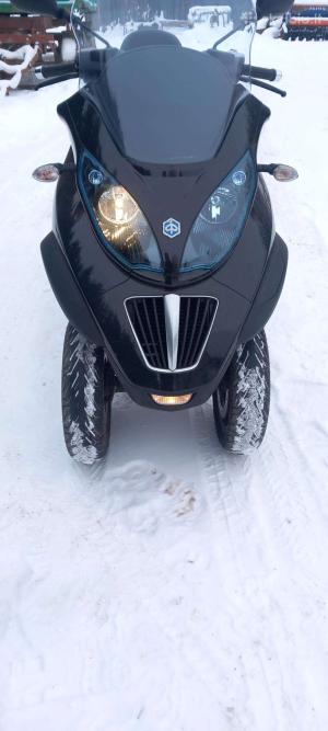Black Piaggio MP3 2009 in Telschi, with an engine capacity of 0.40 L and mileage of 49 thousand km for 1350 €, photo  on AUTOMOTO.COM.LV