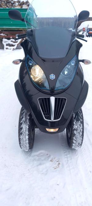 Black Piaggio MP3 2009 in Telschi, with an engine capacity of 0.40 L and mileage of 49 thousand km for 1350 €, photo 13 on AUTOMOTO.COM.LV