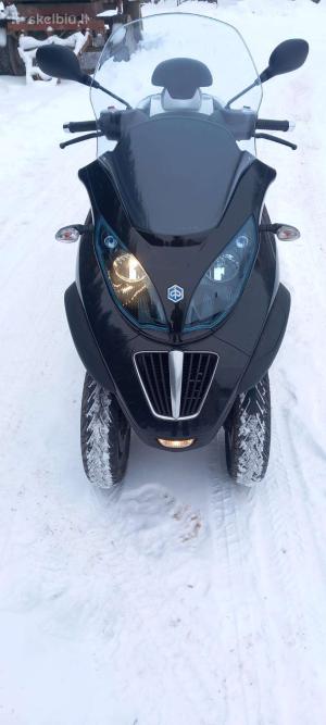 Black Piaggio MP3 2009 in Telschi, with an engine capacity of 0.40 L and mileage of 49 thousand km for 1350 €, photo 18 on AUTOMOTO.COM.LV