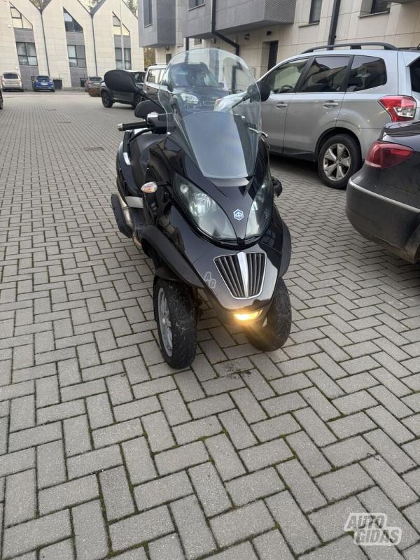 Черный Piaggio MP3 2009 в Вильнюс, объемом двигателя 0.40 л и пробегом 35 тыс. км за 1850 €, фото 4 на AUTOMOTO.COM.LV