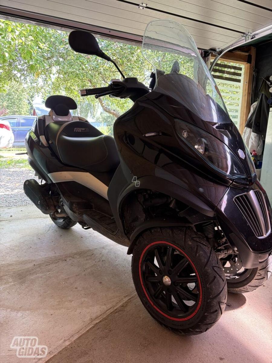 Black Piaggio MP3 2009 in Vilnius, with an engine capacity of 0.25 L and mileage of 38 thousand km for 1400 €, photo 1 on AUTOMOTO.COM.LV