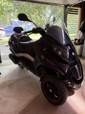 Black Piaggio MP3 2009 in Vilnius, with an engine capacity of 0.25 L and mileage of 38 thousand km for 1400 €, photo 3 on AUTOMOTO.COM.LV