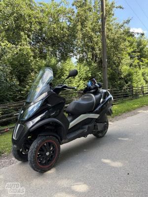 Black Piaggio MP3 2009 in Vilnius, with an engine capacity of 0.25 L and mileage of 38 thousand km for 1400 €, photo 4 on AUTOMOTO.COM.LV