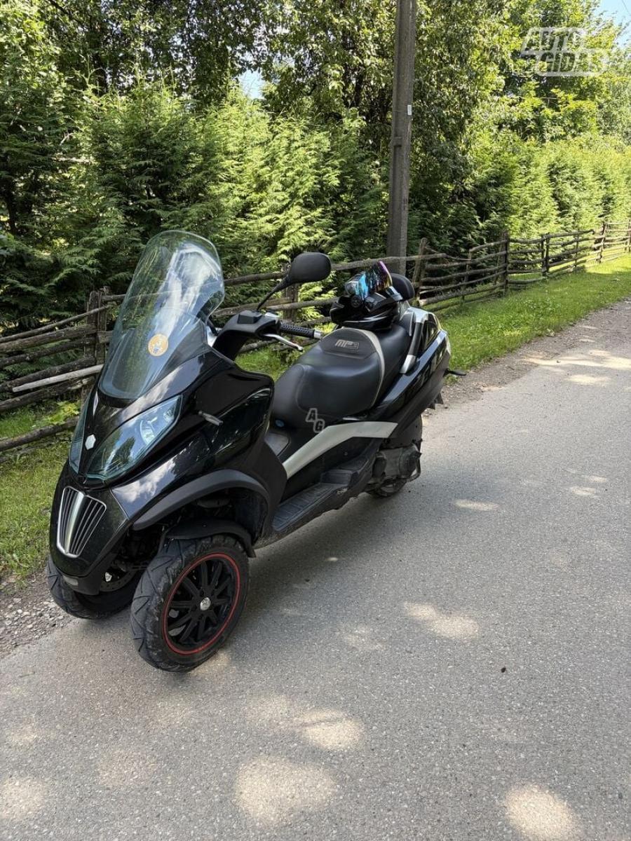 Black Piaggio MP3 2009 in Vilnius, with an engine capacity of 0.25 L and mileage of 38 thousand km for 1400 €, photo 5 on AUTOMOTO.COM.LV
