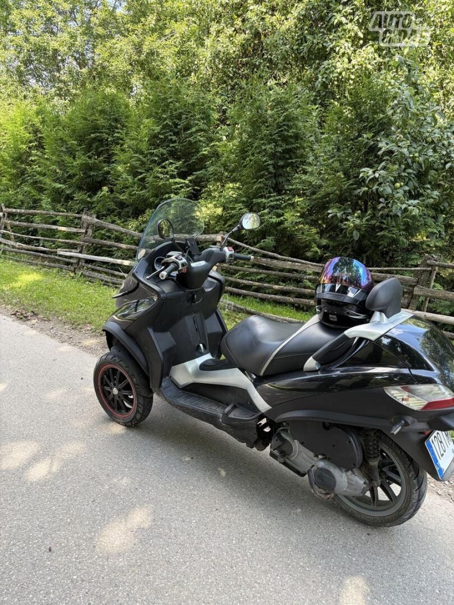 Black Piaggio MP3 2009 in Vilnius, with an engine capacity of 0.25 L and mileage of 38 thousand km for 1400 €, photo 6 on AUTOMOTO.COM.LV