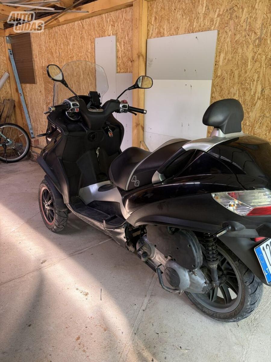 Black Piaggio MP3 2009 in Vilnius, with an engine capacity of 0.25 L and mileage of 38 thousand km for 1400 €, photo 9 on AUTOMOTO.COM.LV