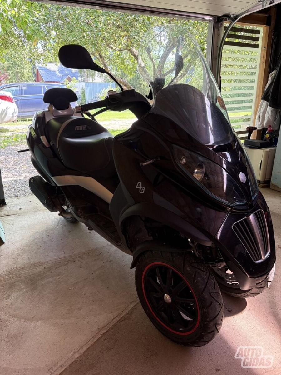 Black Piaggio MP3 2009 in Vilnius, with an engine capacity of 0.25 L and mileage of 38 thousand km for 1400 €, photo 3 on AUTOMOTO.COM.LV
