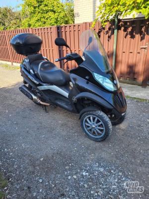 Black Piaggio MP3 2010 in Klaipeda, with an engine capacity of 56.00 L and mileage of 0 thousand km for 1650 €, photo  on AUTOMOTO.COM.LV